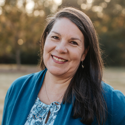 Leigh DeLozier cropped portrait – The Storyteller Squad